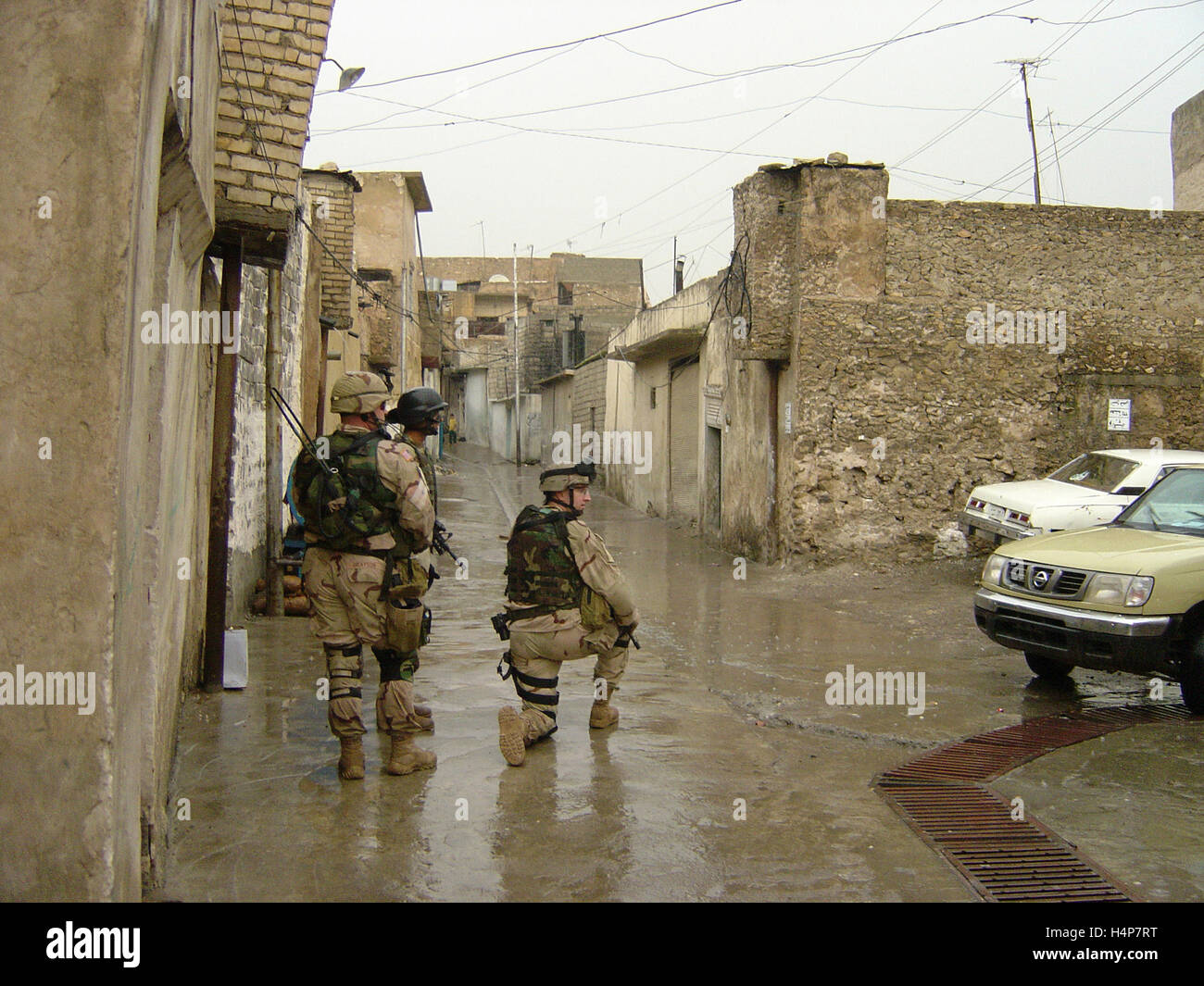 22nd November 2004 U.S. Army & Iraqi soldiers on the rain-soaked ...