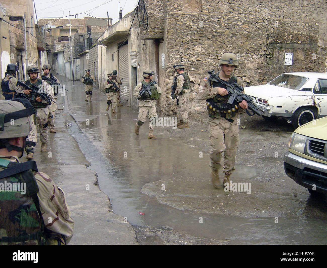 22nd November 2004 U.S. Army & Iraqi soldiers on the rain-soaked ...