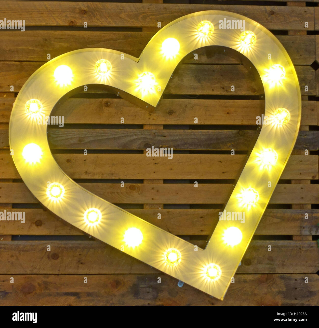 Light bulb in heart shape hi-res stock photography and images - Alamy