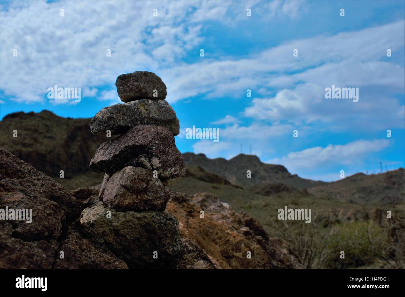 Man made rock formation, with a beautiful back drop of Route 66 in AZ ...