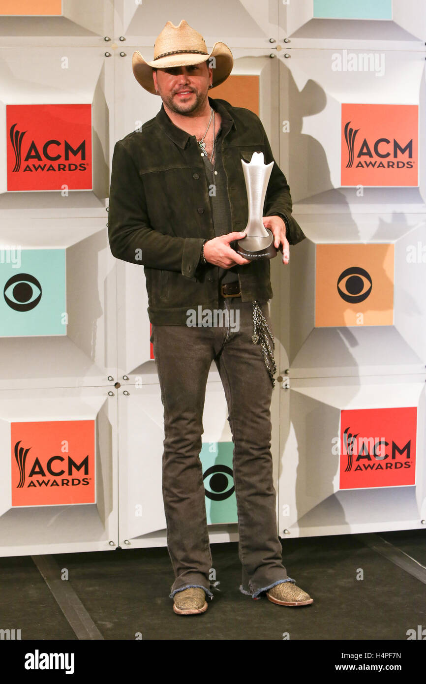 Singer Jason Aldean, winner of the Entertainer of the Year award, poses ...