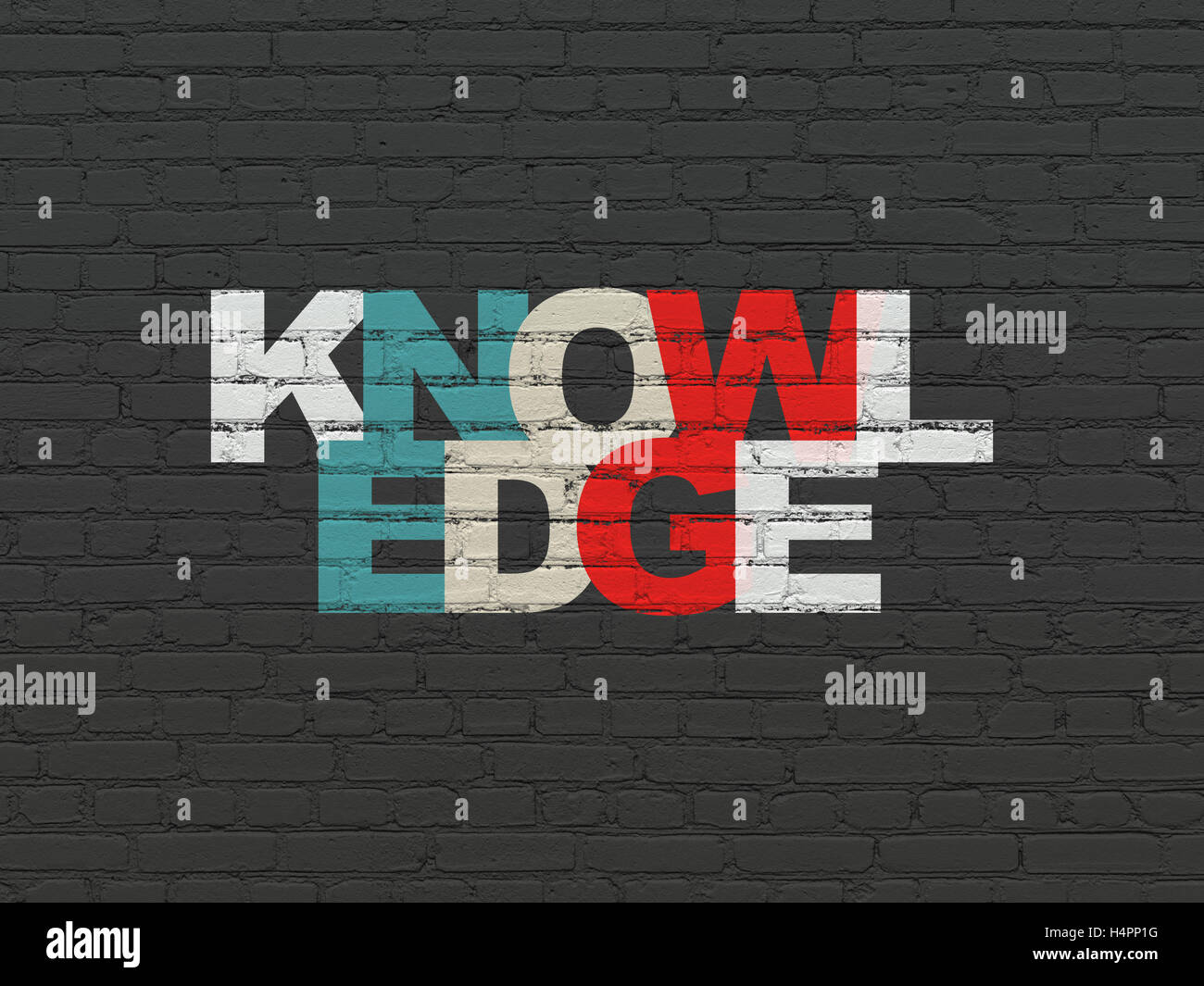 Learning concept: Knowledge on wall background Stock Photo - Alamy