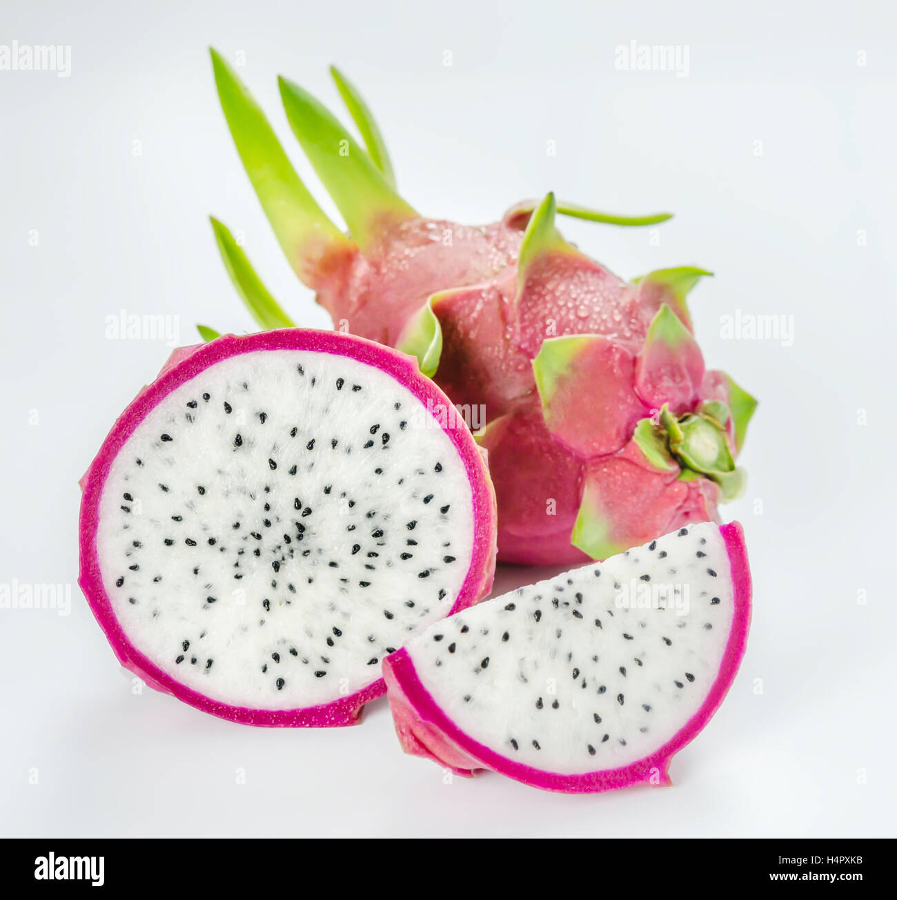 Ripe Dragon fruit or Pitaya with slice on white background Stock Photo ...