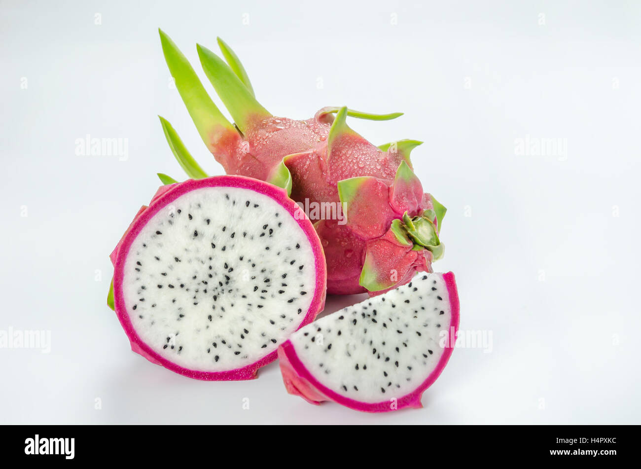 Ripe Dragon fruit or Pitaya with slice on white background Stock Photo ...