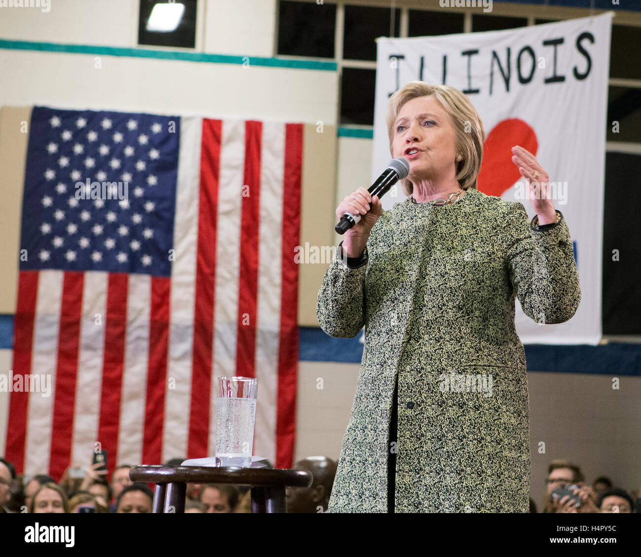 Hillary Clinton smiling while giving a speech at the Get Out the Vote ...
