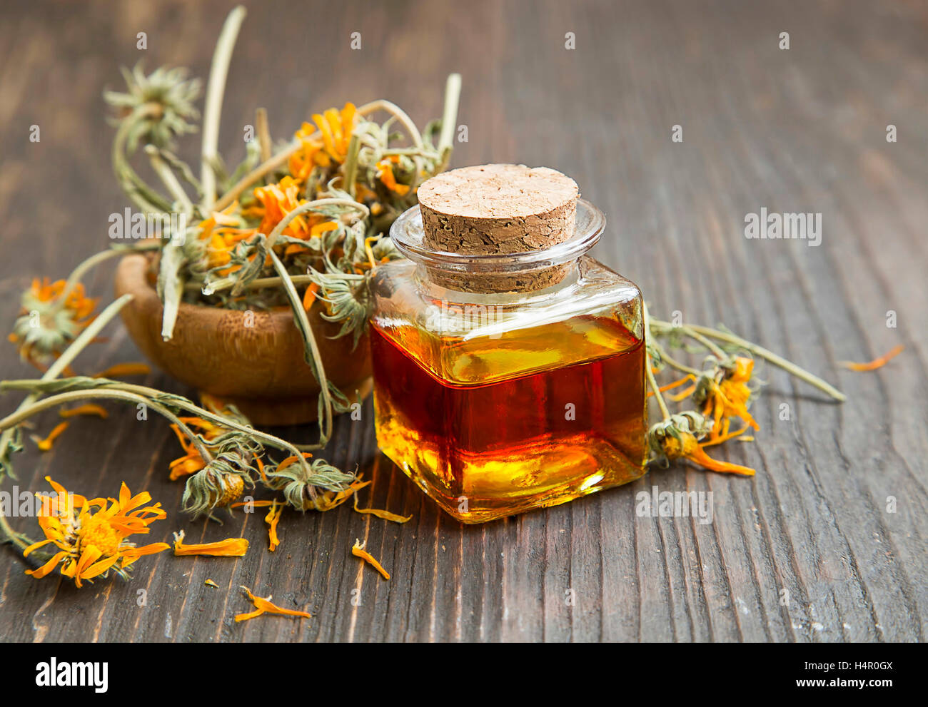 Aromatherapy oil with marigold flowers hi-res stock photography and ...