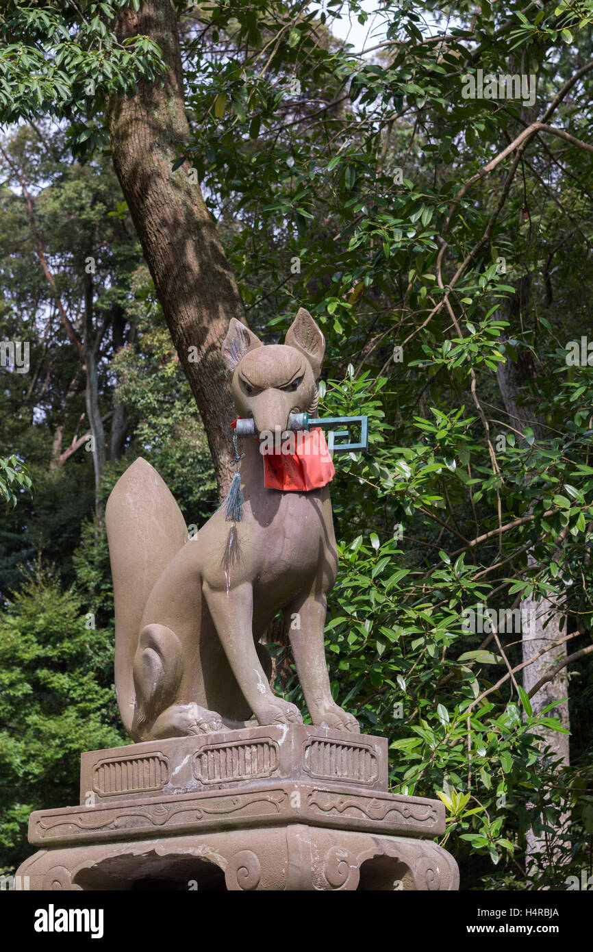 Kitsune, the fox, holds a key in its mouth at Fushimi Inari Taisha ...
