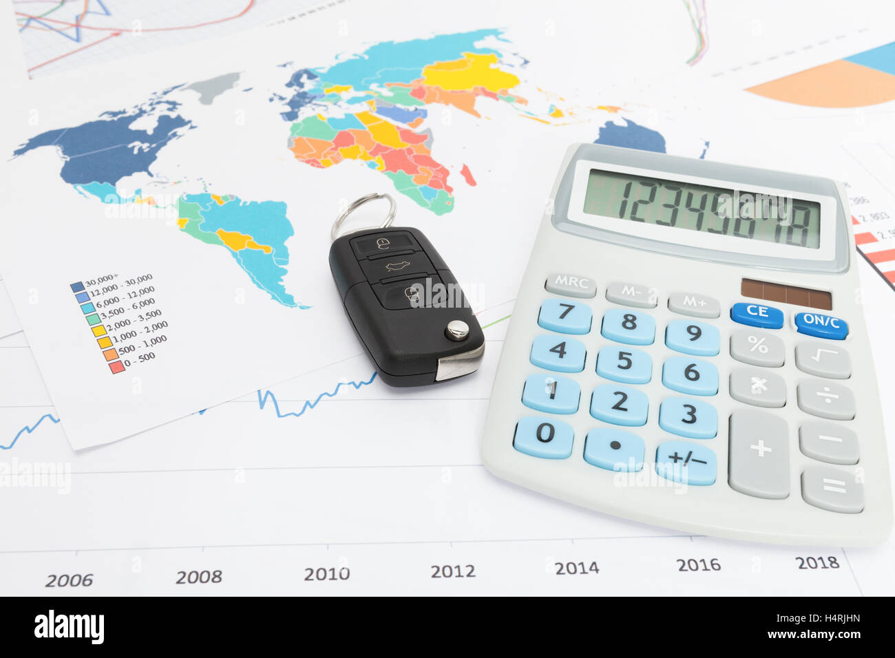 Transportation concept - car key with calculator series Stock Photo - Alamy