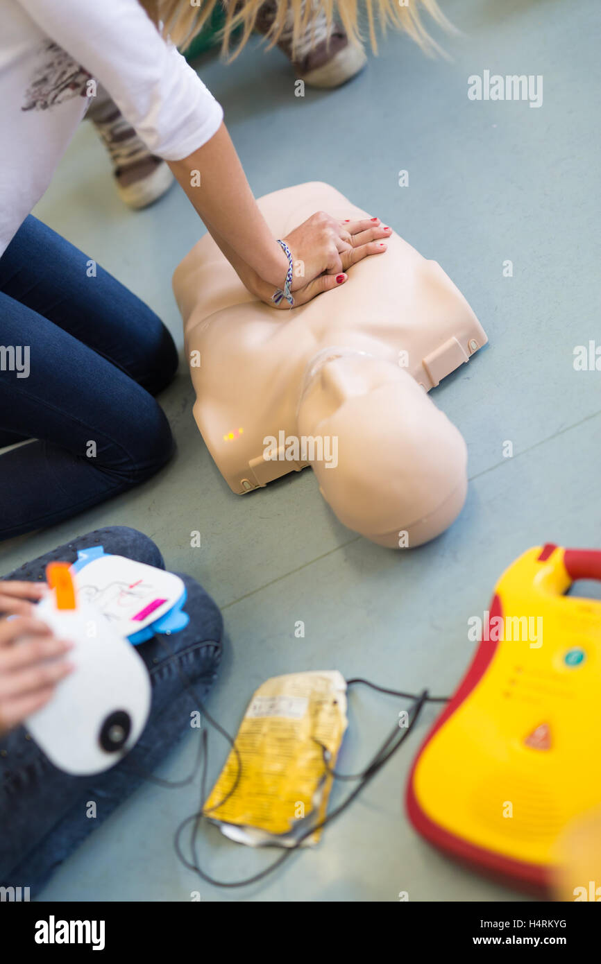 First aid resuscitation course using AED Stock Photo - Alamy