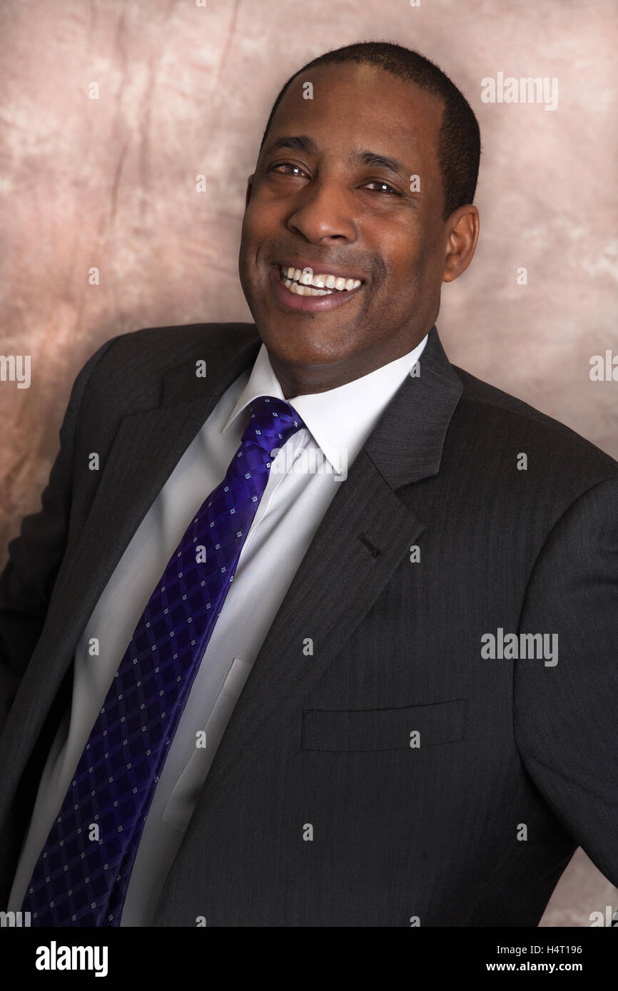 Business Man against plain background Stock Photo - Alamy