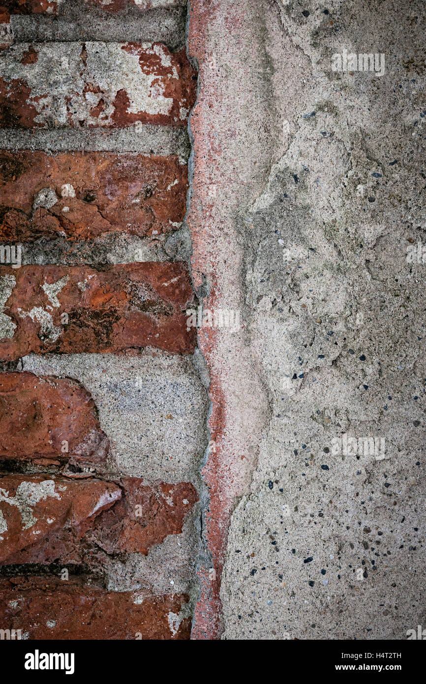 Antique wall with red old bricks and layers of plaster in Toulouse ...