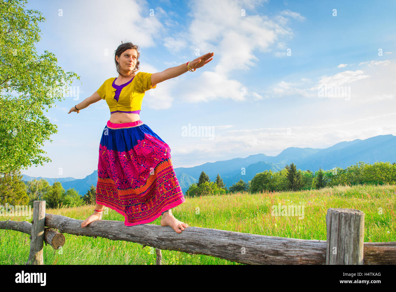 Stretching over fence hi-res stock photography and images - Alamy