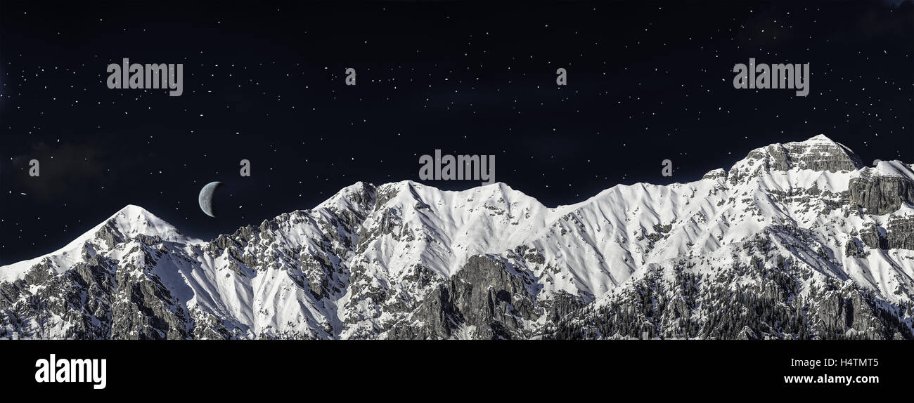 chain of mountains in winter in the night Stock Photo - Alamy