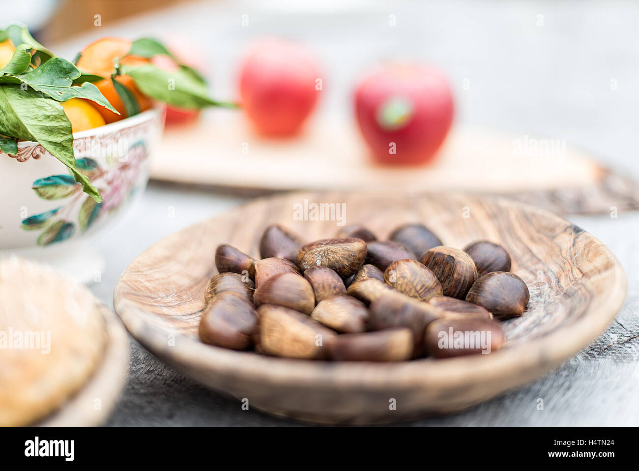 chestnuts in bowl on table Stock Photo - Alamy