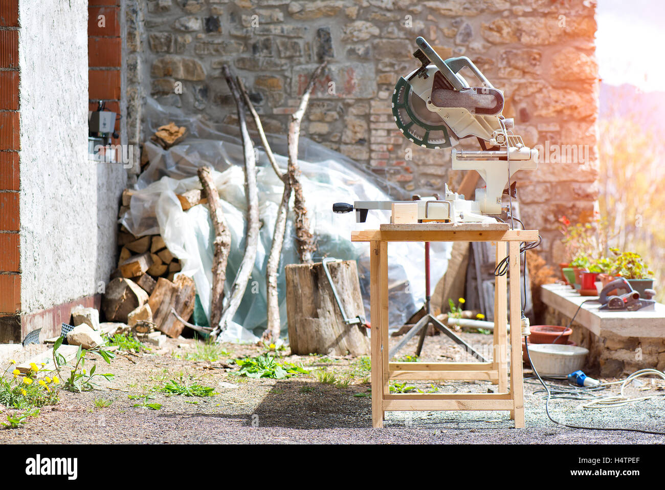 Circular carpenter in the yard outside the home Stock Photo - Alamy