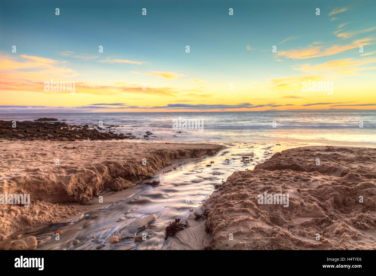 Little Corona Beach in Corona Del Mar, California at sunset in ...