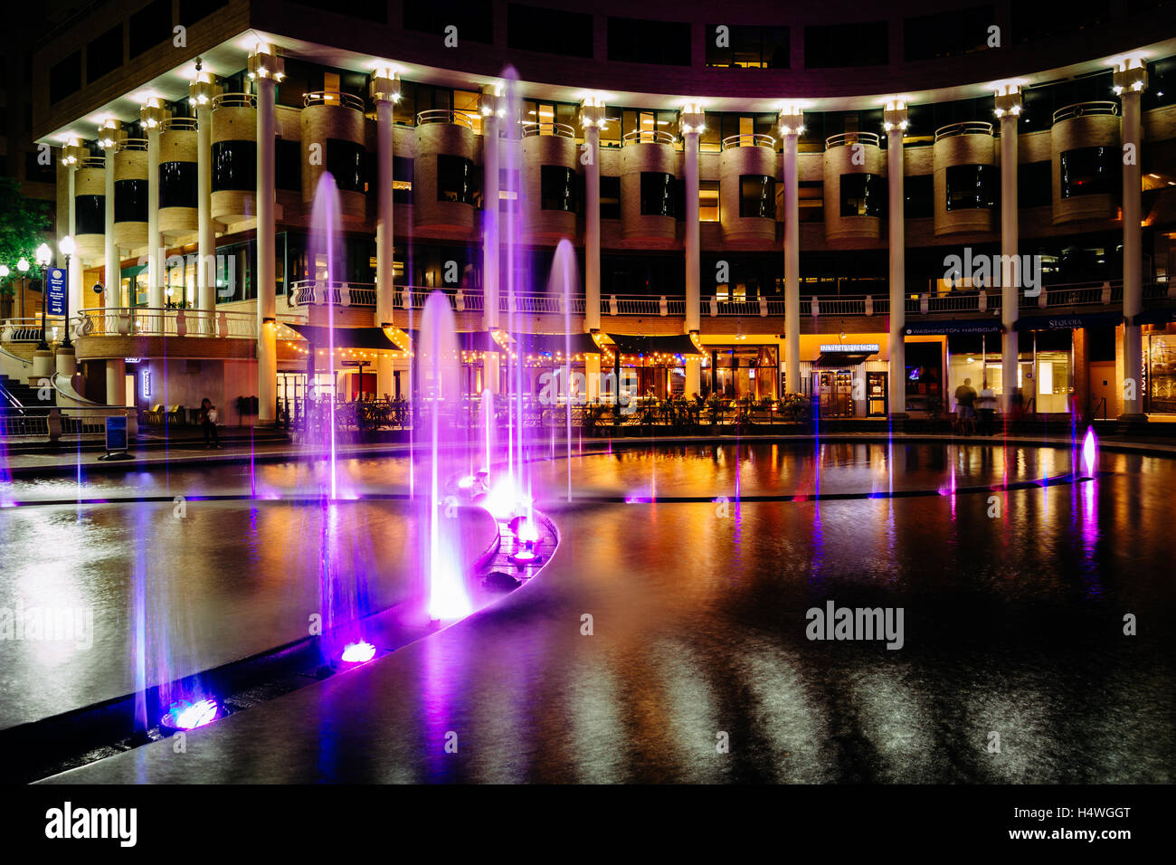Fountains and buildings at night, in Georgetown, Washington, DC Stock ...