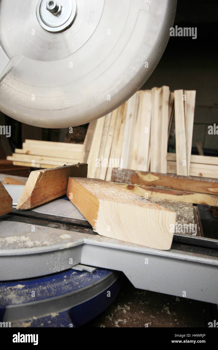 Circular Saw Cutting a Wood Plank Stock Photo - Alamy