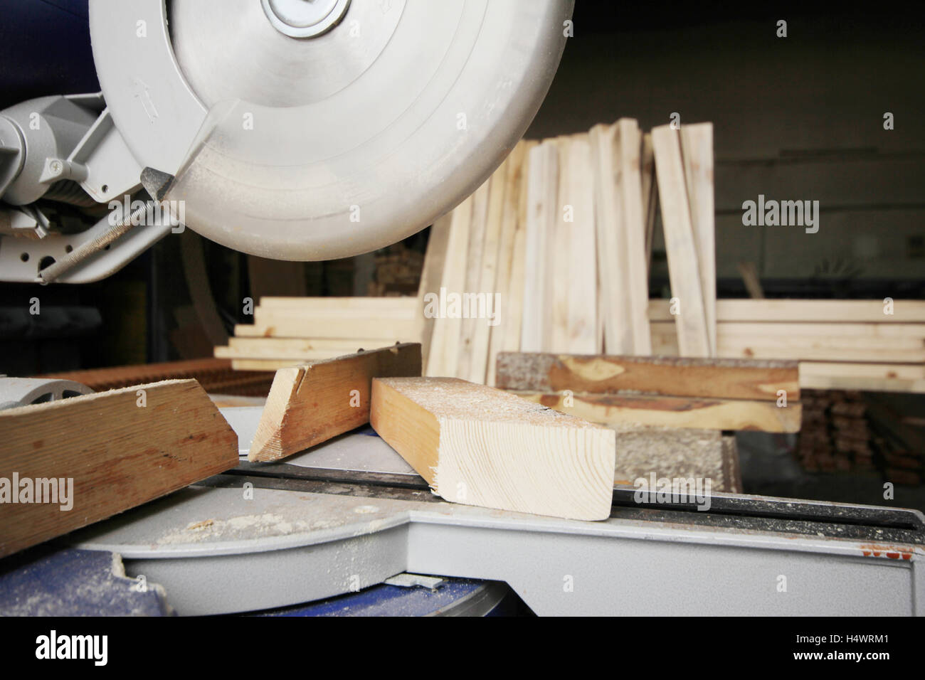 Circular Saw Cutting a Wood Plank Stock Photo - Alamy