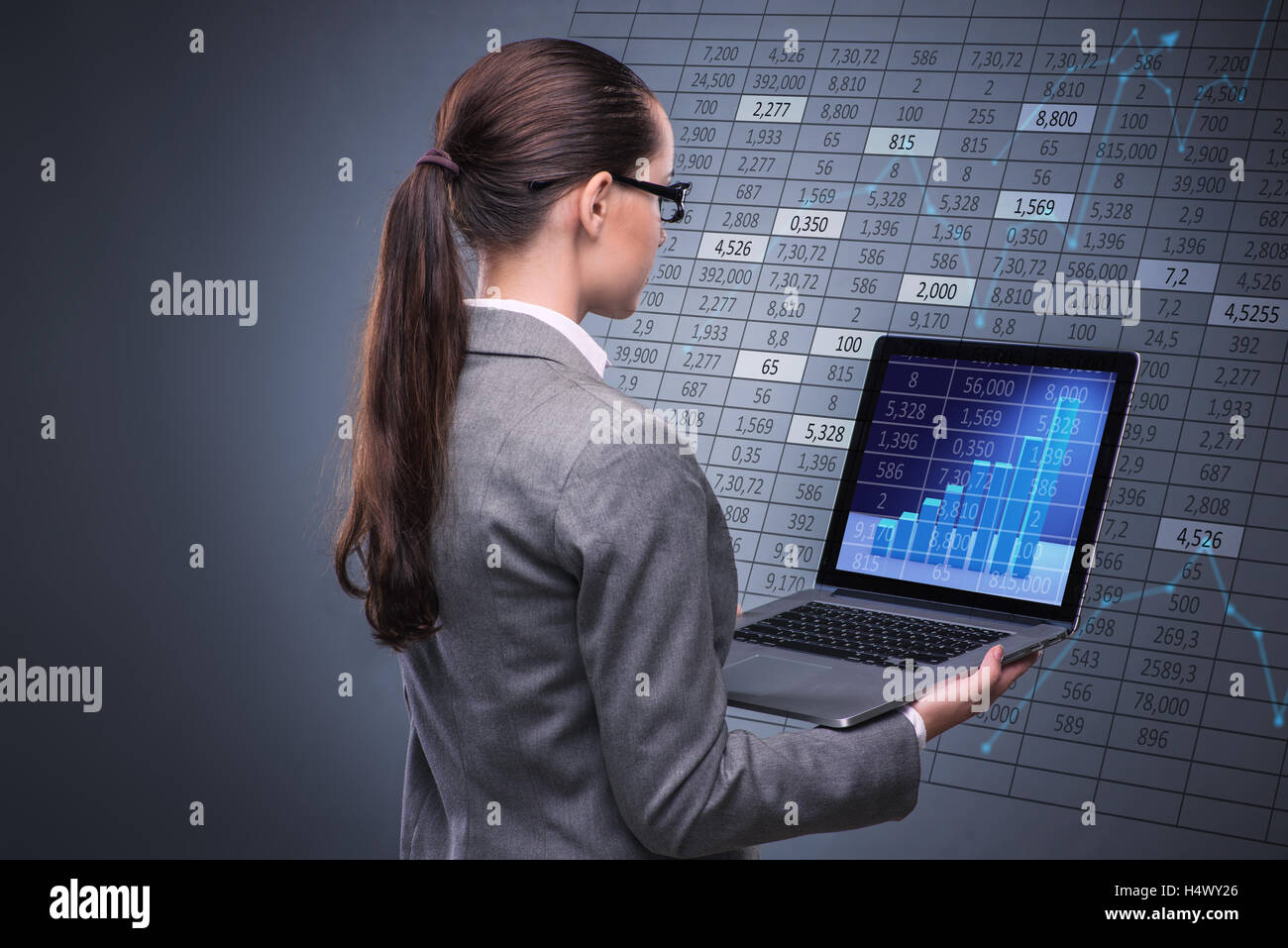 Female financial trader working in hi-res stock photography and images ...