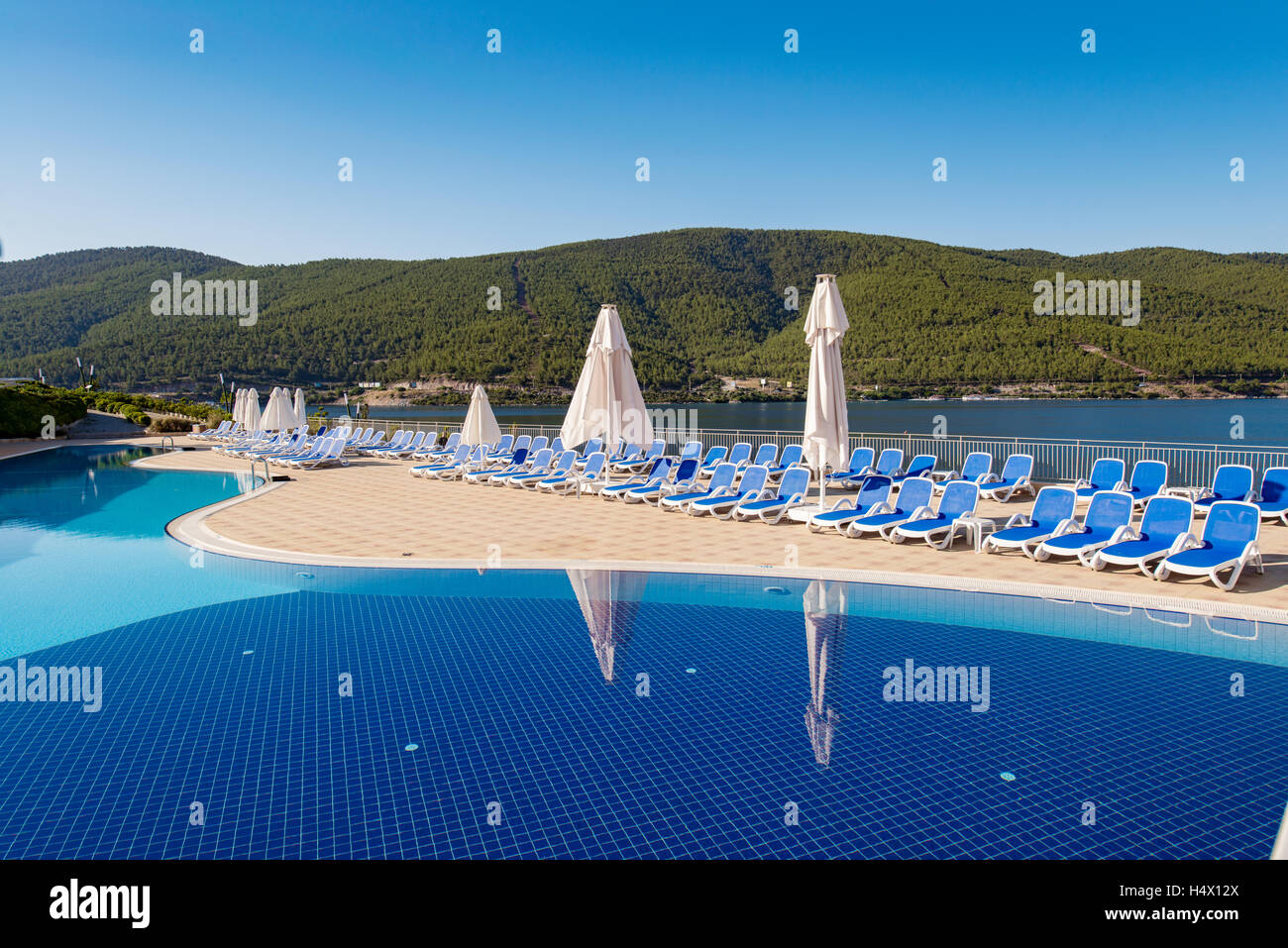 Swimming pool on bright summer day Stock Photo - Alamy