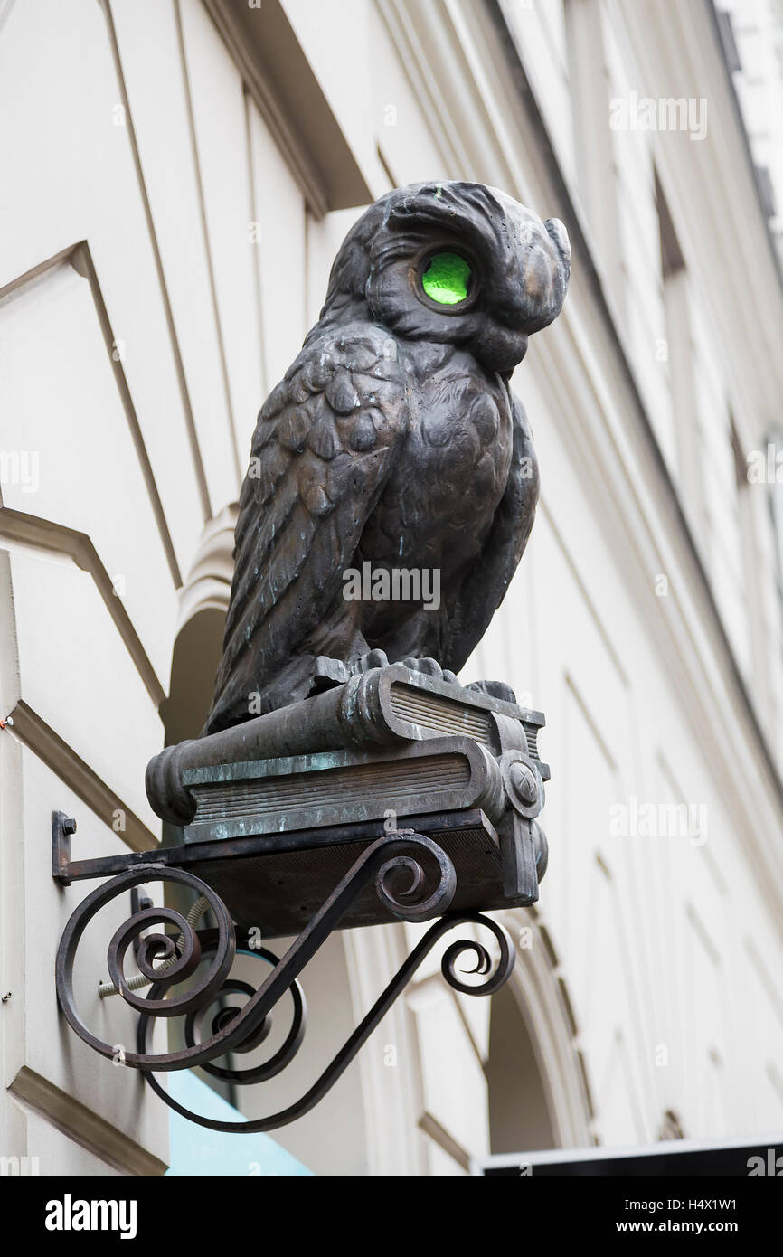 small sculpture of owl over the entrance to the building Stock Photo ...