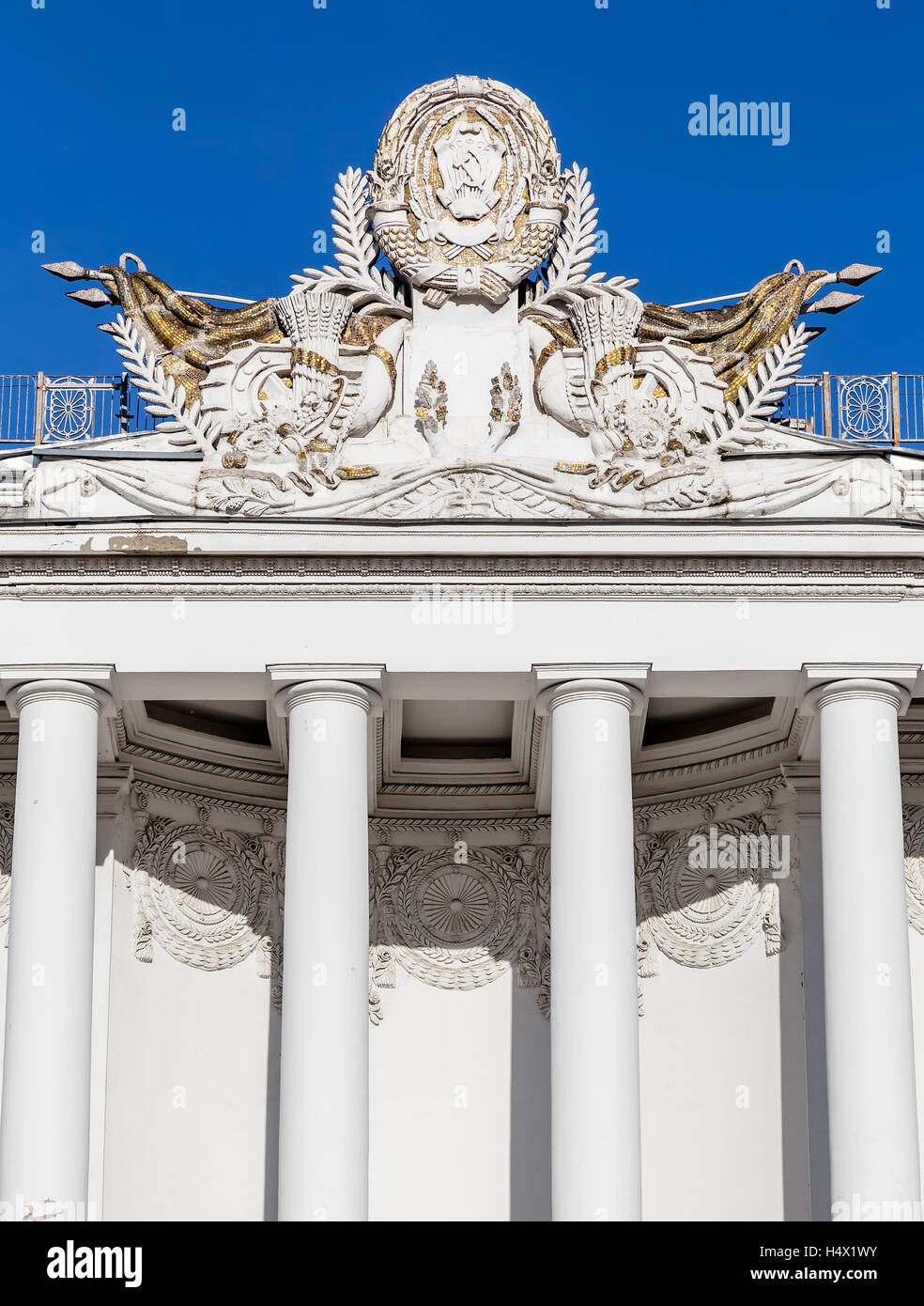 A fragment of a building with symbols of the Soviet Union. Moscow ...