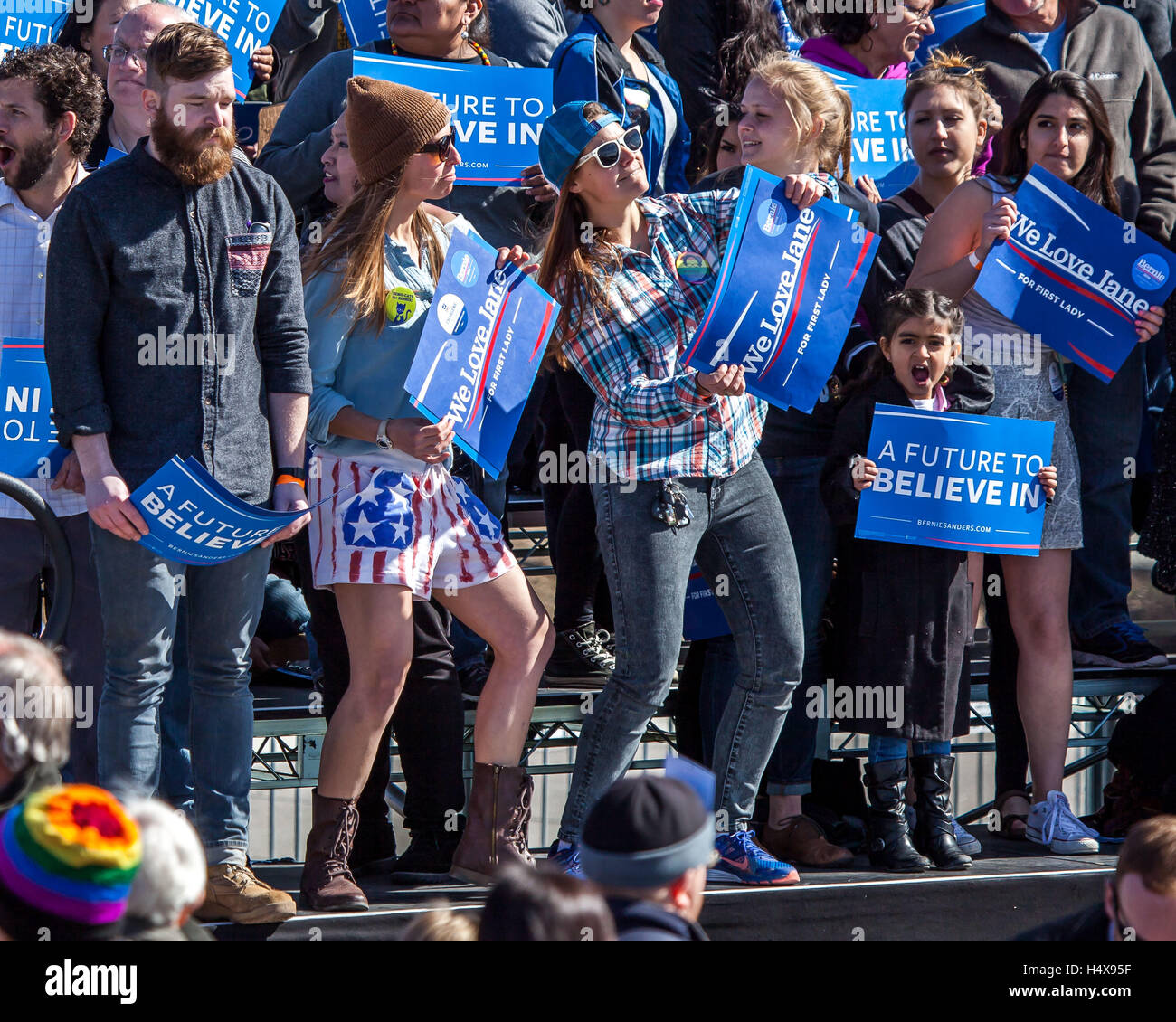 Crowd of supporters holding signs dancing at A Future to Believe In ...