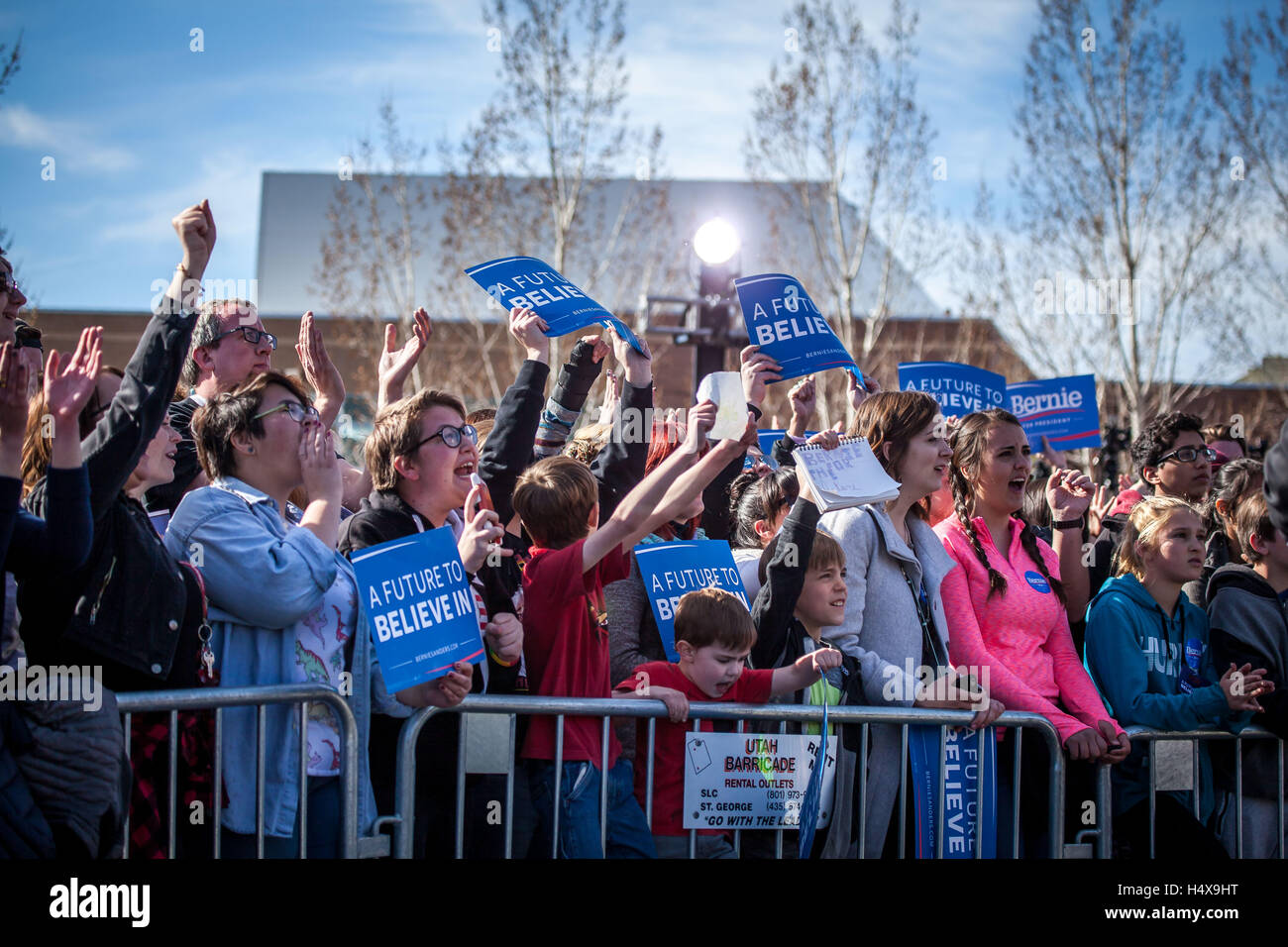 Crowd of supporters holding signs cheering at A Future to Believe In ...