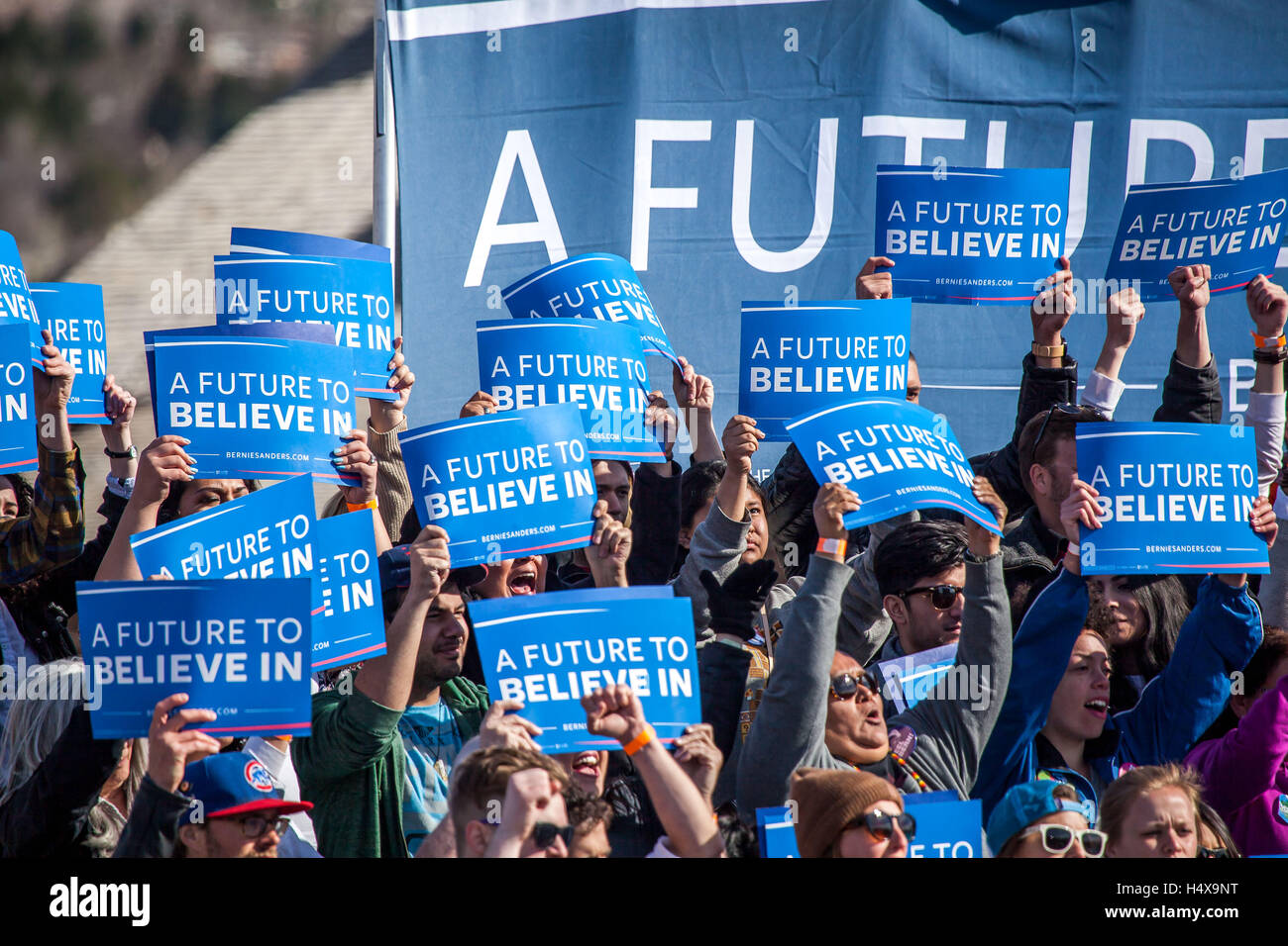 Crowd of supporters holding signs attend A Future to Believe In Salt ...