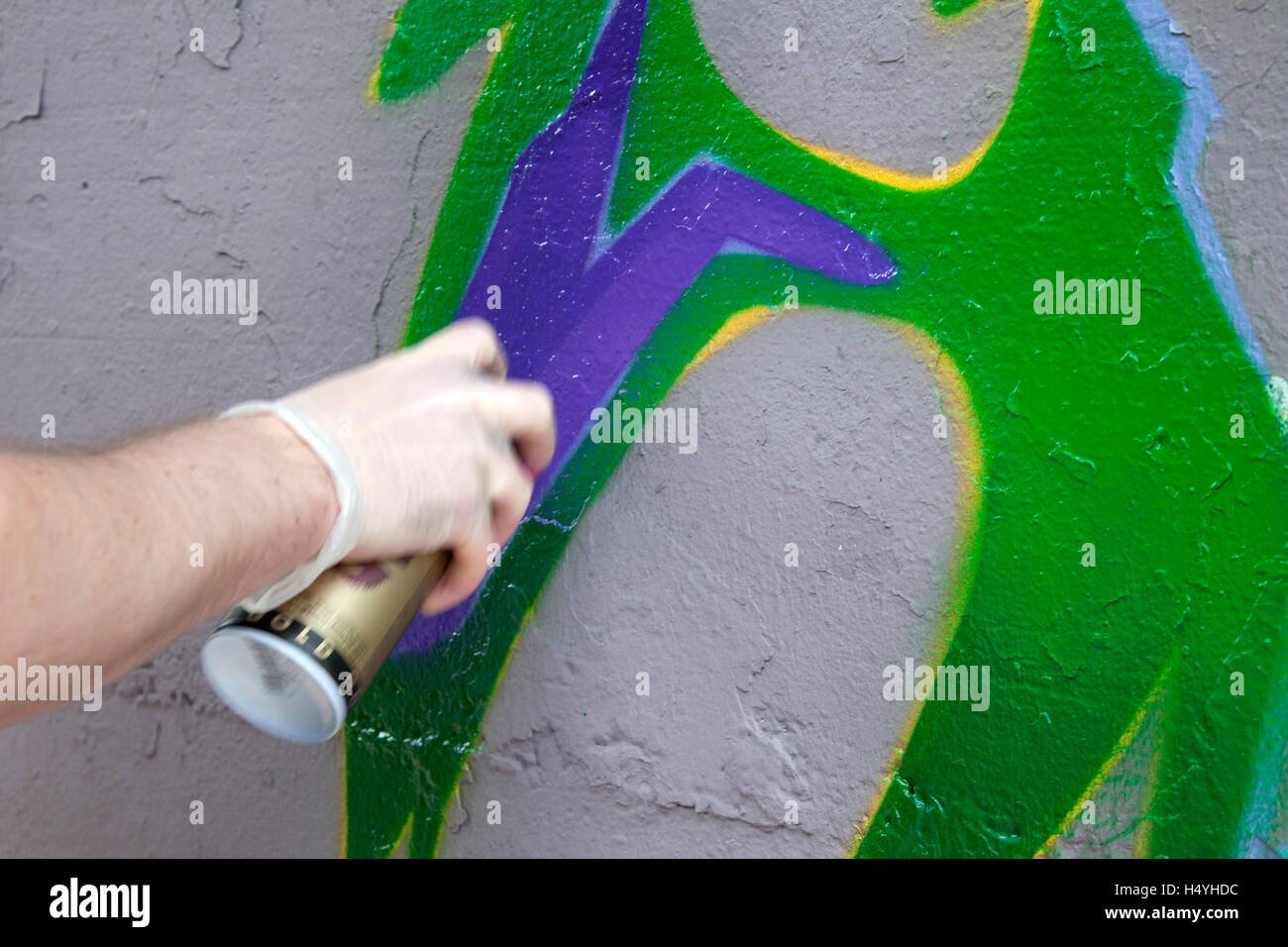 Hand holding a spray can, graffiti artist at the Wall of Fame, wall ...