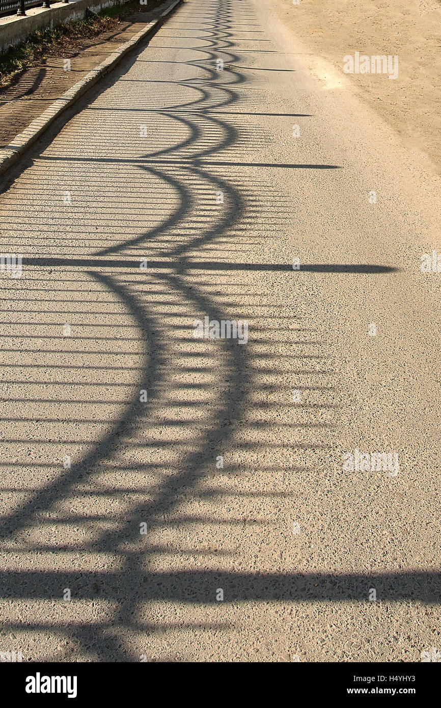 Fence casting shadow hi-res stock photography and images - Alamy
