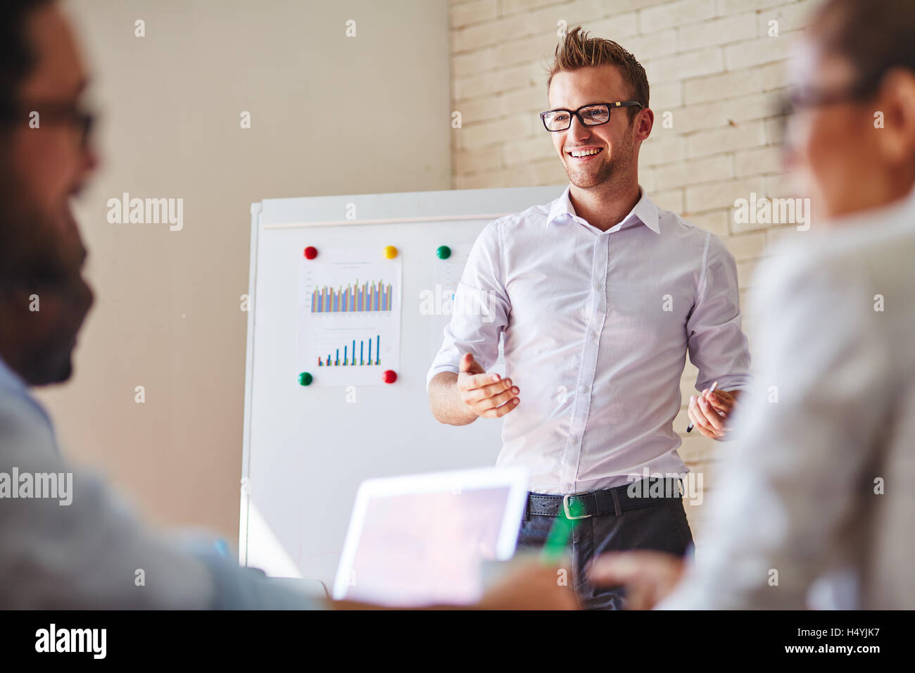 Business professional sharing his experience with beginners Stock Photo ...