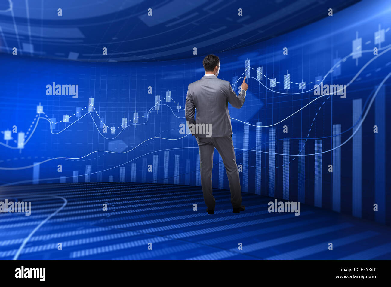 Man in stock exchange trading concept Stock Photo - Alamy