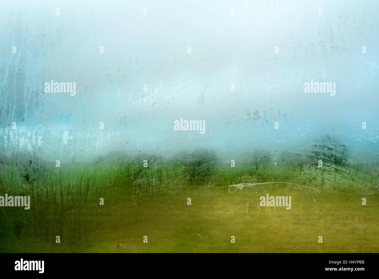 Fogged window through which an abstract landscape is seen Stock Photo ...
