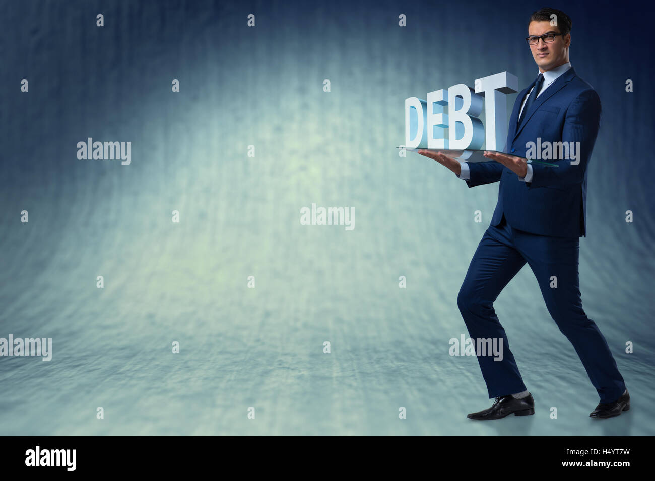 Man struggling with high debt Stock Photo - Alamy