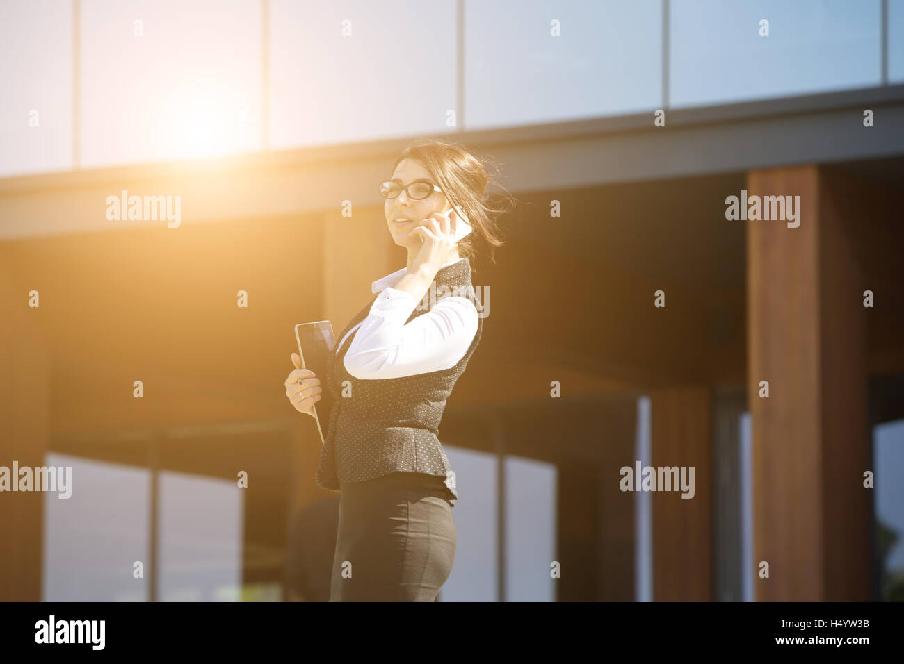 Portrait of a young smiling business woman Stock Photo - Alamy Portrait of a young smiling business woman Stock Photo - Alamy