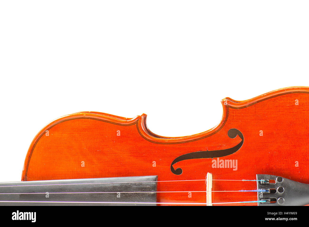 Detail of red violin on white background Stock Photo - Alamy