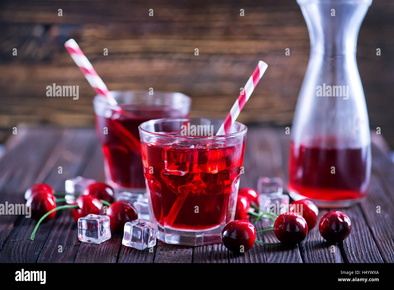 cherry drink in glass and on a table Stock Photo - Alamy