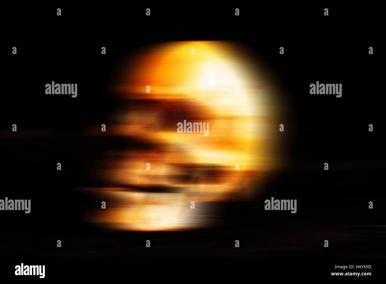 Skull on a black background with a blurred image Stock Photo - Alamy