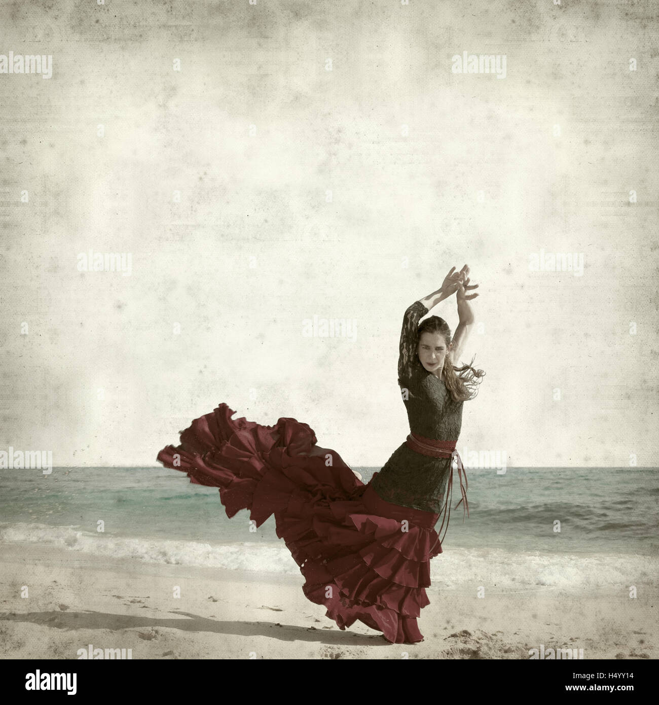 textured old paper background with flamenco dancer by the ocean shore ...