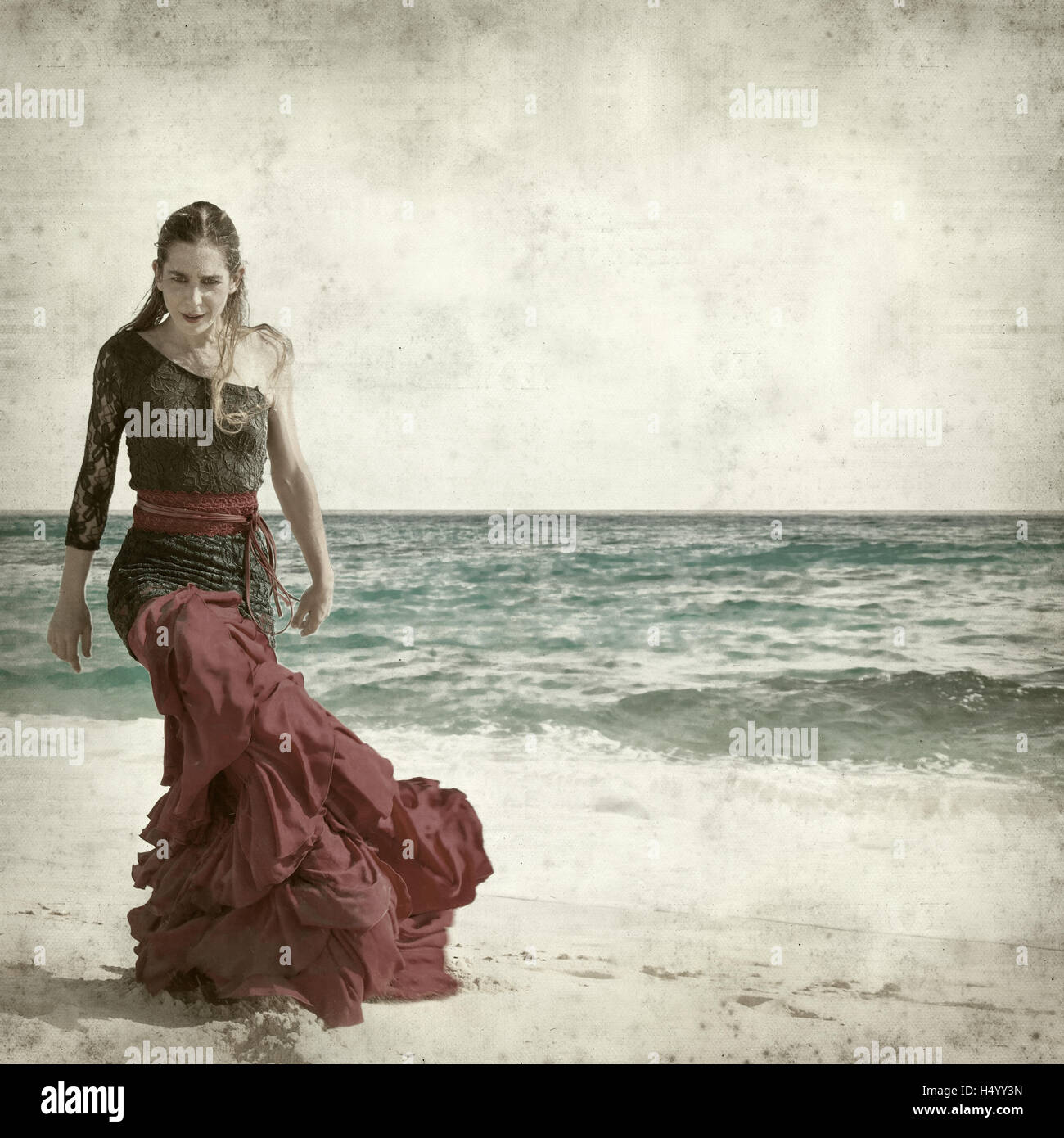 textured old paper background with flamenco dancer by the ocean shore ...