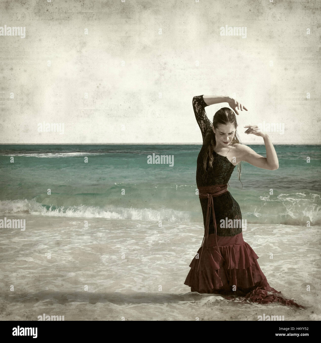 textured old paper background with flamenco dancer by the ocean shore ...