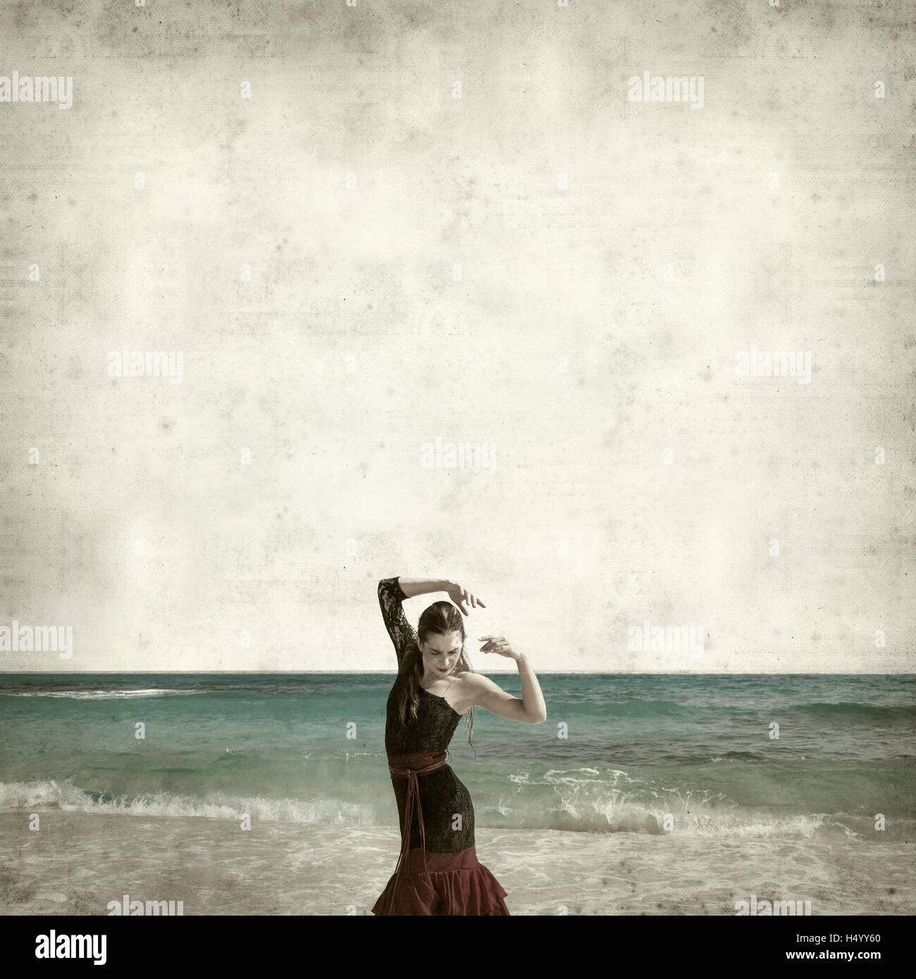 textured old paper background with flamenco dancer by the ocean shore ...