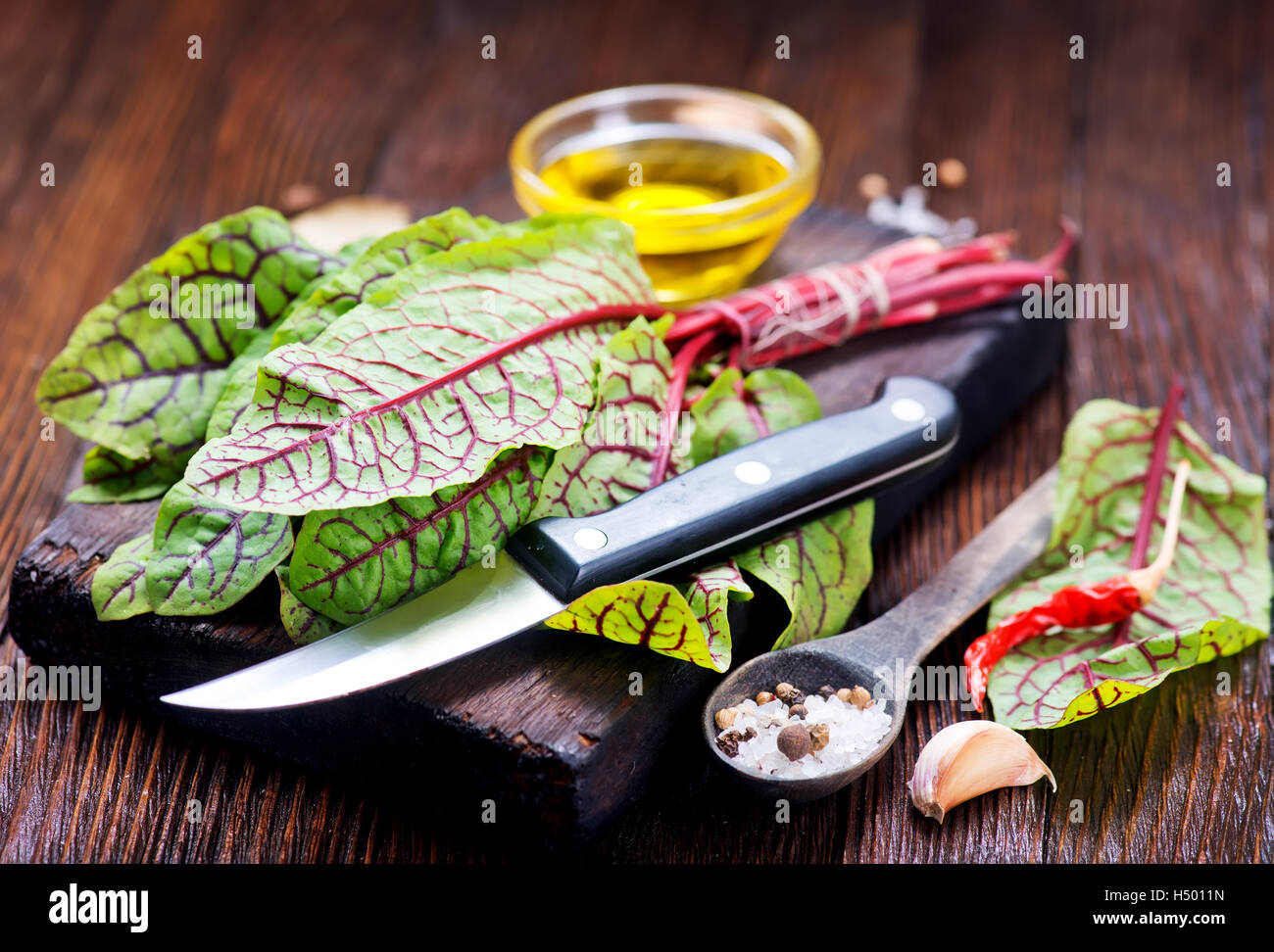 mangold on wooden board and on a table Stock Photo - Alamy
