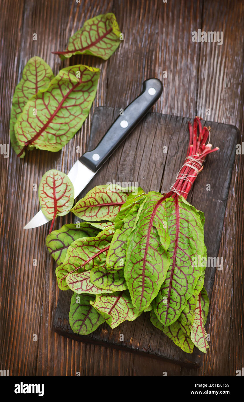 mangold on wooden board and on a table Stock Photo - Alamy