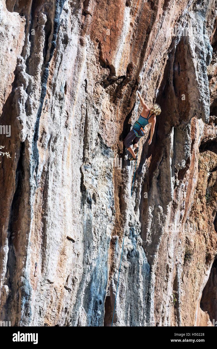 Female Mountain Climber lead climbing natural Rock Stock Photo - Alamy