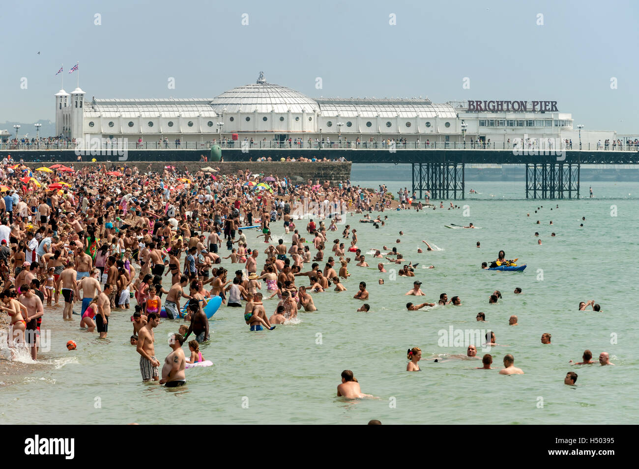 Crowds on the beach at Brighton on a hot July afternoon Stock Photo - Alamy