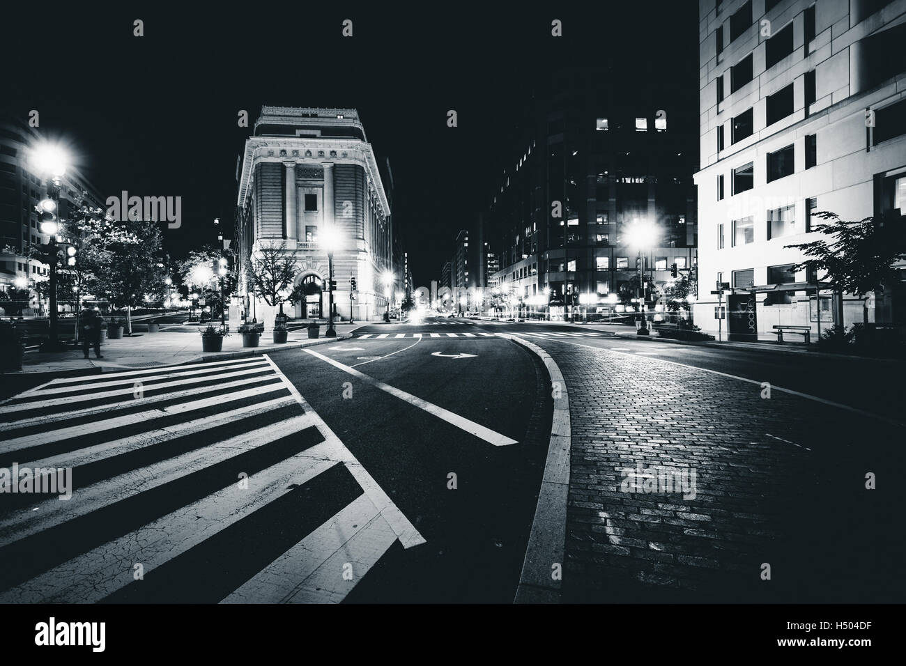 The intersection of H Street and New York Avenue at night, in ...