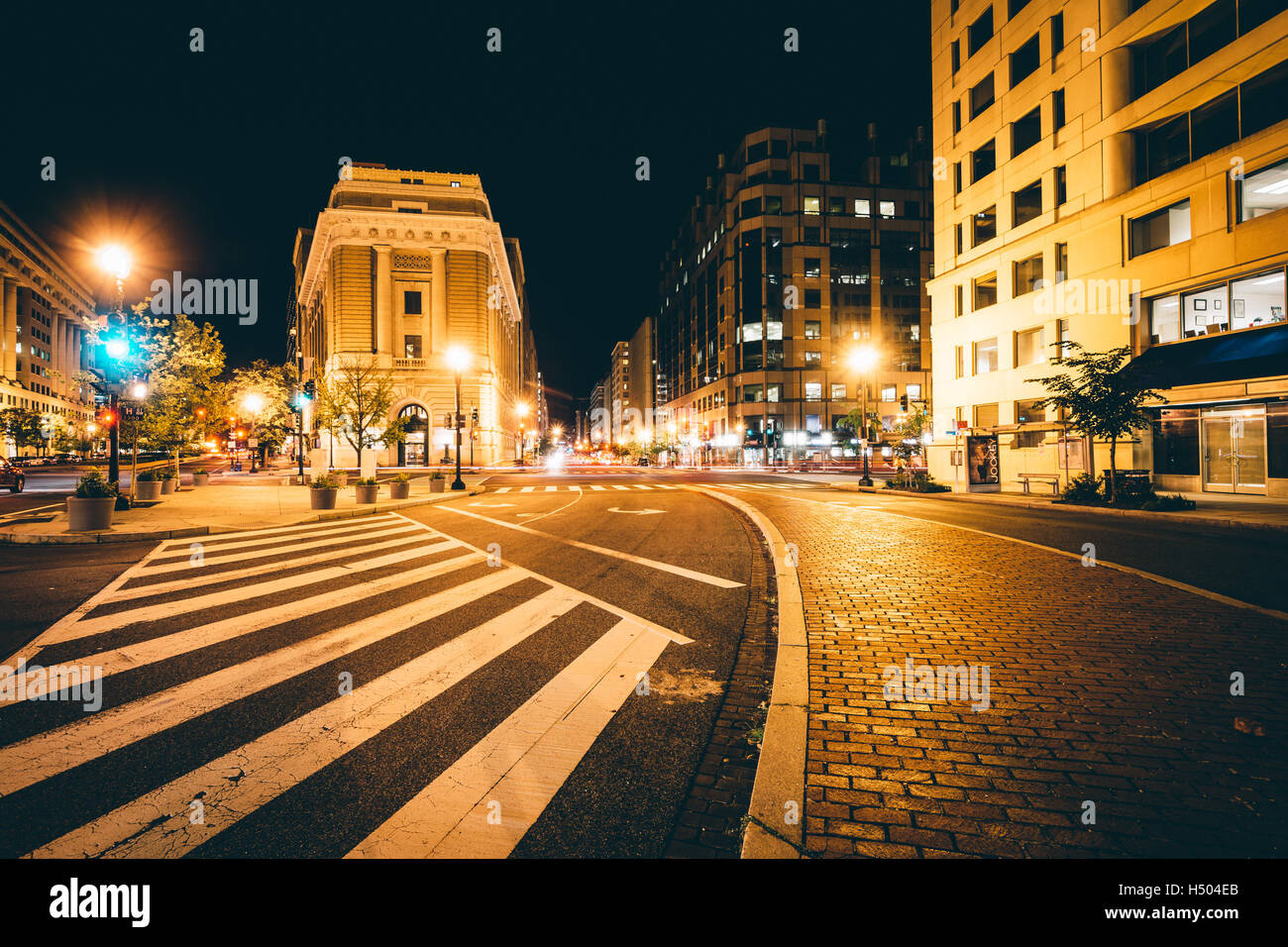 The intersection of H Street and New York Avenue at night, in ...